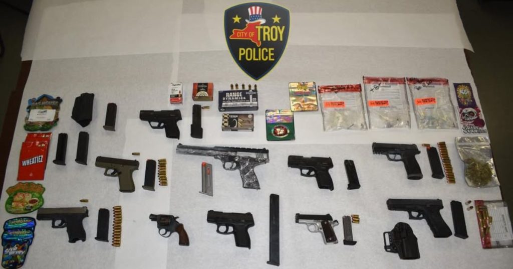 Troy police seize 10 handguns, arrest 7 in Glen Avenue raid - Newport ...